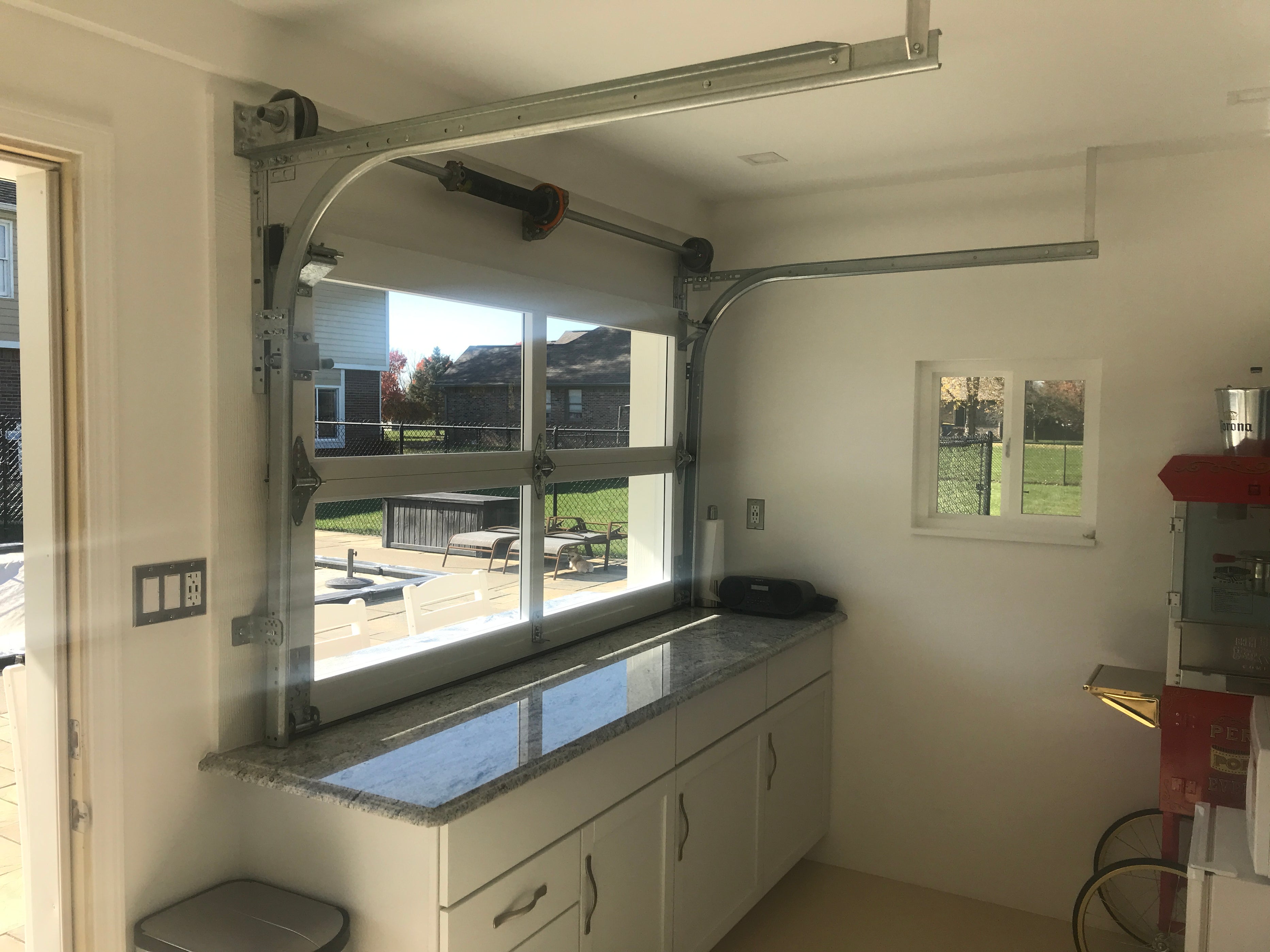 Bar & Restaurant Modern Glass Garage Doors Countertop — Lux Garage Doors