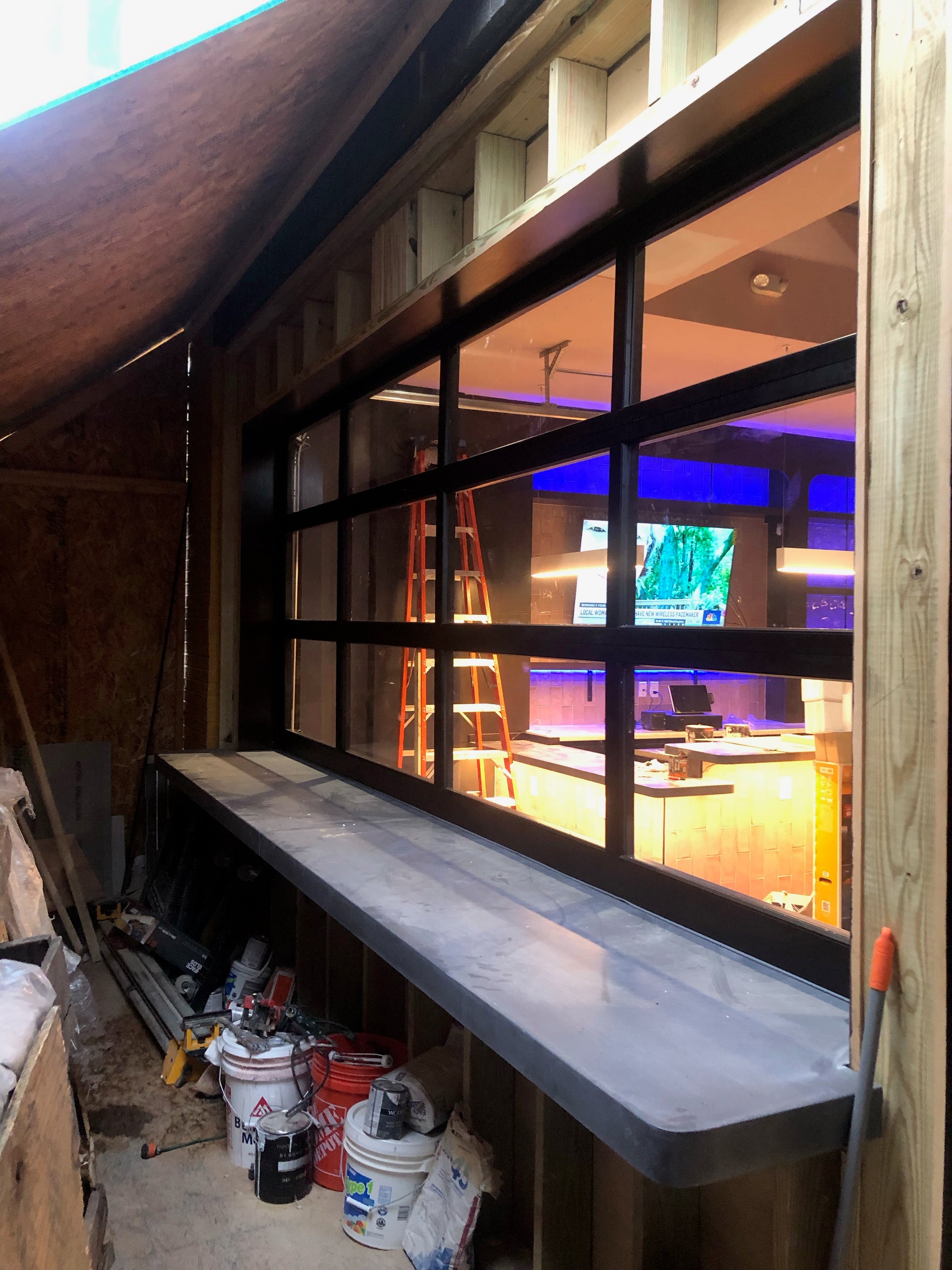 Bar & Restaurant Modern Glass Garage Doors Countertop — Lux Garage Doors