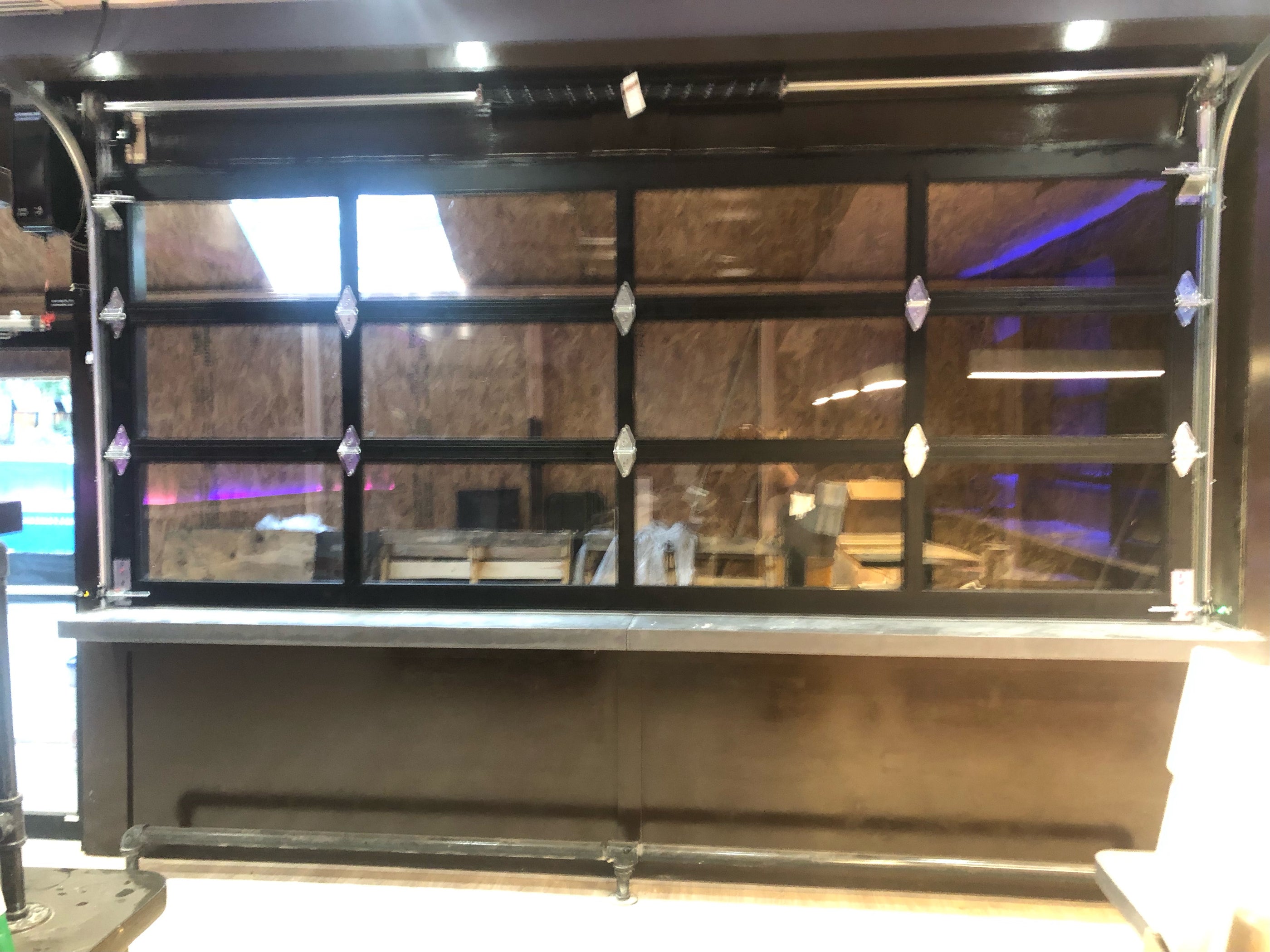 Bar & Restaurant Modern Glass Garage Doors Countertop — Lux Garage Doors