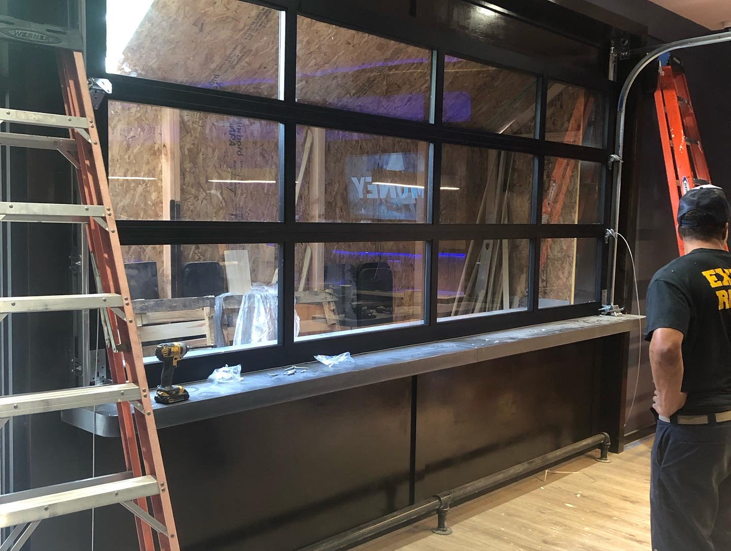 Bar & Restaurant Modern Glass Garage Doors Countertop — Lux Garage Doors
